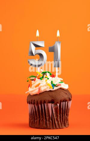 Candle number 51 - Cake birthday in blue background Stock Photo - Alamy