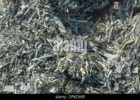 Beg pile of scrap aluminum metal siding from ruined houses after ...