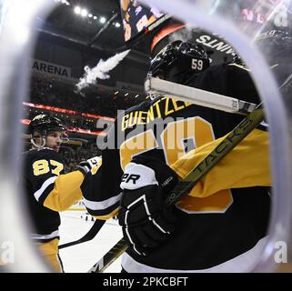 Pittsburgh Penguins' Rickard Rakell, center, celebrates after his goal ...