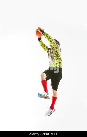 Goalkeeper stopping the ball Stock Photo - Alamy