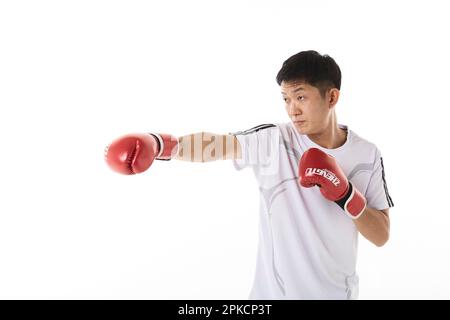 Man hitting a straight Stock Photo - Alamy