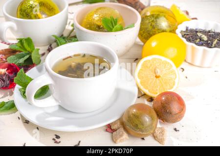 Various tea ball bombs. Assortment of different tea balls with dried ...
