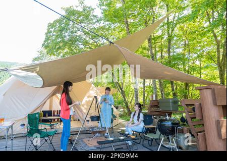 3 women glamping Stock Photo - Alamy
