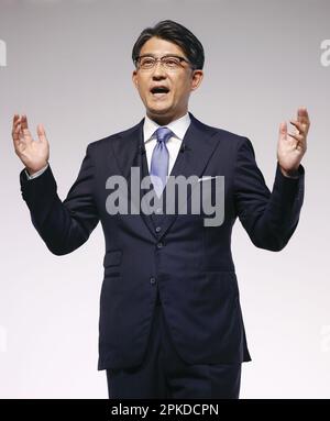 Koji Sato, president of Toyota Motor Co., delivers a speech during a ...