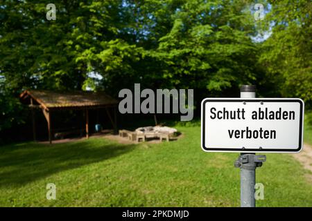 Unloading of debris prohibited Stock Photo - Alamy