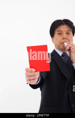 Man giving red card Stock Photo - Alamy