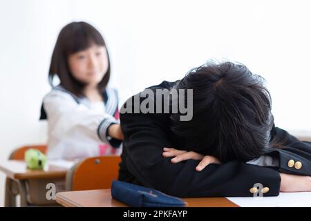 Snoozing junior high school students Stock Photo - Alamy