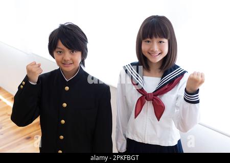 High school student posing with her guts Stock Photo - Alamy