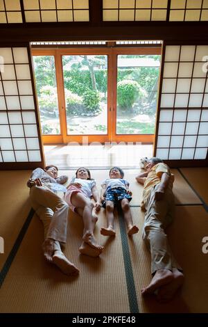 Sister and brother taking a nap in a Japanese-style room Stock Photo ...