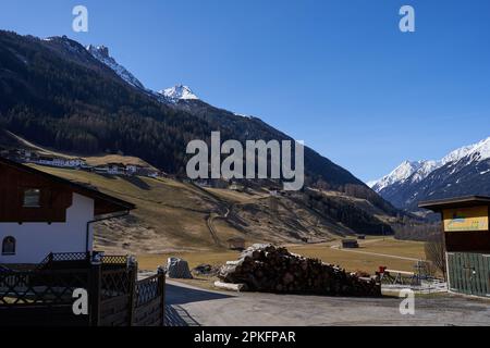 Neder, Austria - March 16, 2023 - a small town in an alpine valley ...