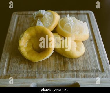 Lemons juiced, Lemons squeezed, food prep Stock Photo - Alamy