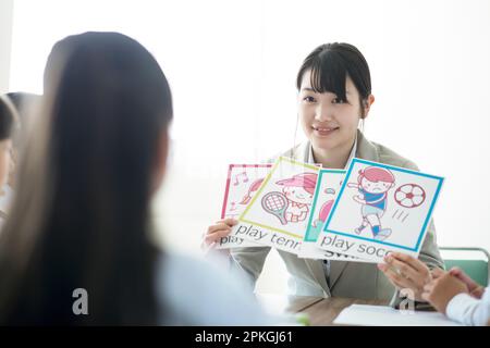 Teachers who teach English to elementary school students Stock Photo ...
