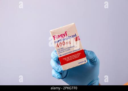 Rio, Brazil - January 27, 2023, hand with protective rubber glove ...