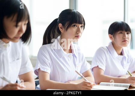 Nursing students taking a class in a classroom Stock Photo - Alamy