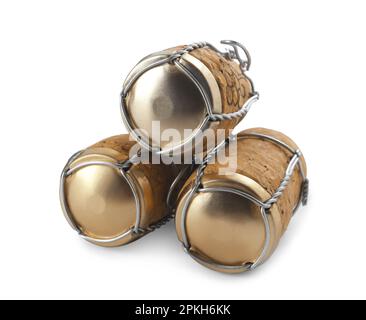 Sparkling wine corks with muselet caps on white background Stock Photo ...