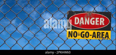 No Go Area sign on chain link fence Stock Photo - Alamy