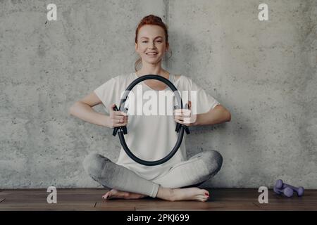 Happy young woman in leggins runs in city garden Stock Photo - Alamy