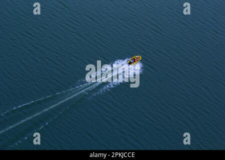 A top-down view of the speed of a motorboat sailing on water Stock ...