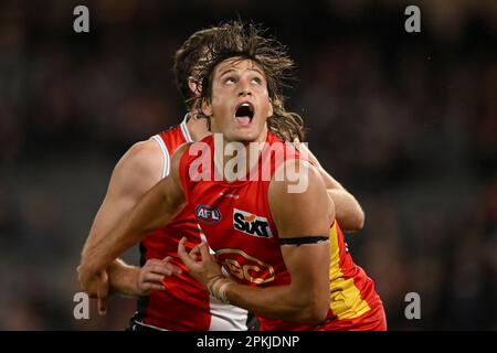 Zaine Cordy of the Saints and Ned Moyle of the Suns compete in the ruck ...