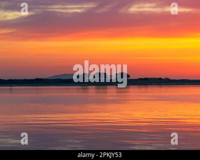 Morning reflections on Baldoyle Bay Stock Photo - Alamy