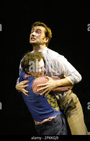 l-r: Adam Godley (Michal), David Tennant (Katurian) in THE PILLOWMAN by ...