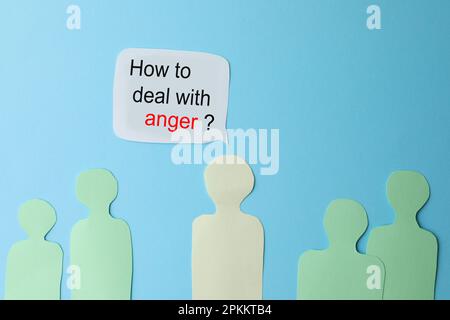 Paper speech bubble with inscription How To Deal With Anger? on light ...