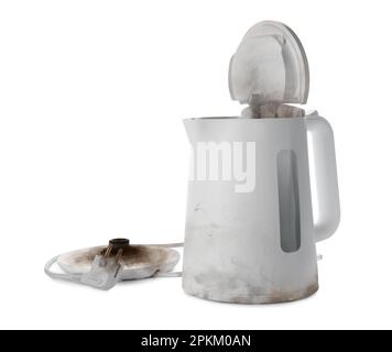 Burnt electric kettle with base and plug on white background Stock ...