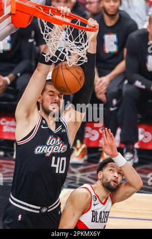 Portland Trail Blazers guard Skylar Mays (5) passes the ball as Phoenix ...