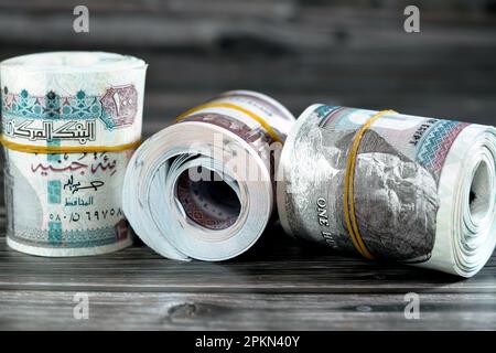 Rolls of Egypt money banknote bills of 100 and 50 EGP LE one hundred ...