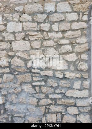 Wallpaper area paved with stones Stock Photo - Alamy