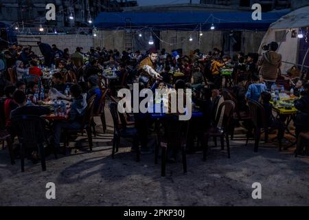08 April 2023, Syria, Idlib: A view of a mass iftar for orphaned ...