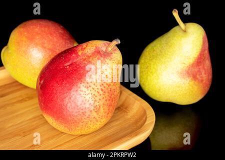 Three fresh organic pears on a wooden surface Stock Photo - Alamy