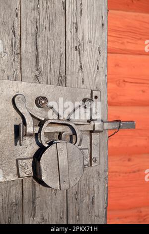 Finland, Oulu, wrought iron lock on door of an old granary, on the ...