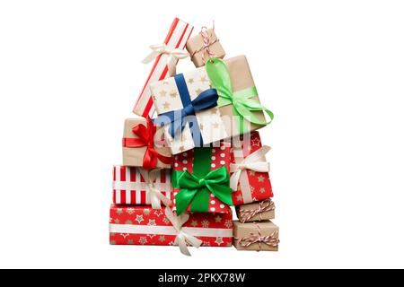 Christmas tree made of beautifuly wrapped presents on colored ...