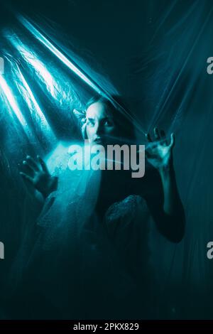 Horror fear night terror terrified woman trapped Stock Photo - Alamy