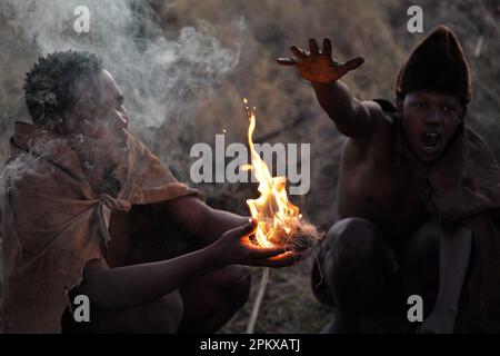 San Bushmen showing traditional way of making fire Stock Photo - Alamy