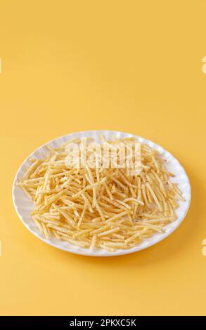 Top view of vegetable straw chips inside the snack bag Stock Photo - Alamy