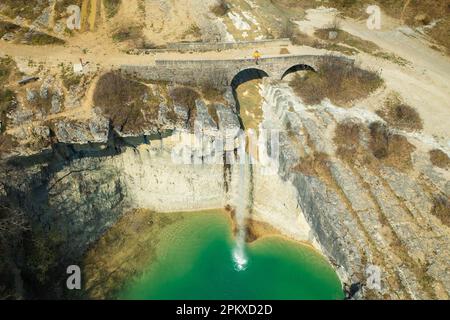 Aerial view of Sopot waterfall with a stone bridge in Istra, Croatia ...