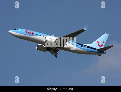 A Boeing 737-8 MAX of TUI departing London Gatwick Airport Stock Photo ...