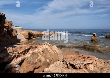 Small and steep Cala Las Rotas, popular for bathing and snorkelling ...