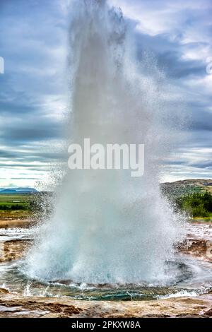 Strokkur is a fountain geyser located in a geothermal area in the ...