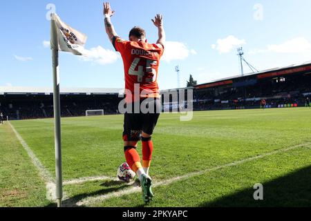Luton Town's Alfie Doughty takes a corner during the Sky Bet ...