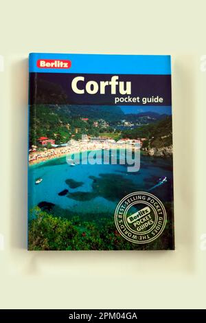 Corfu Berlitz Travel Guide book with British passport on suitcase ...