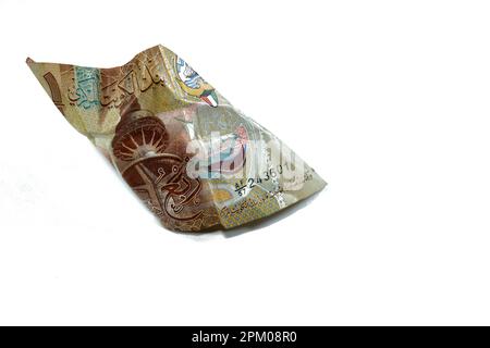 Crumpled Kuwaiti money of change KWD quarter Kuwait dinar bill banknote ...