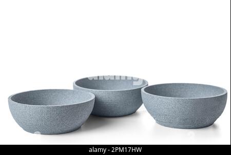Decorative plaster bowls isolated on white background Stock Photo - Alamy