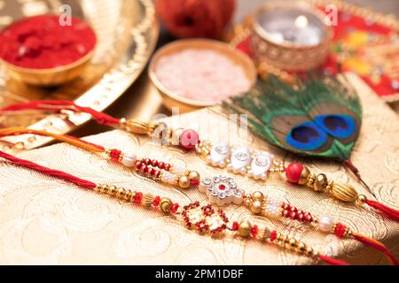Set of rakhi on golden background, raksha bandhan concept Stock Photo ...