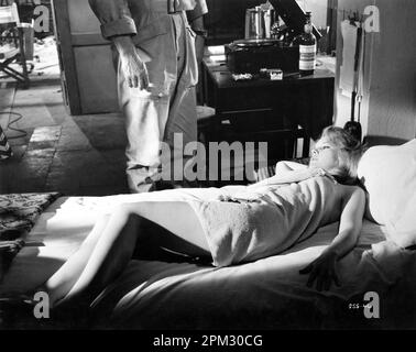 Carroll Baker, Peter van Eyck, on-set of the film, "Station Six Sahara ...