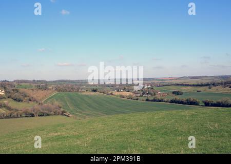 View across farmland towards Lyminge on the North Kent Downs from ...