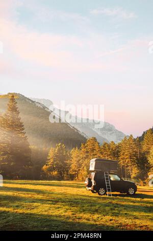 Mountain off-road during sunrise Stock Photo - Alamy