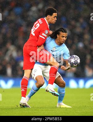 Bayern Munich's Jamal Musiala (right) and Alphonso Davies ahead of the ...